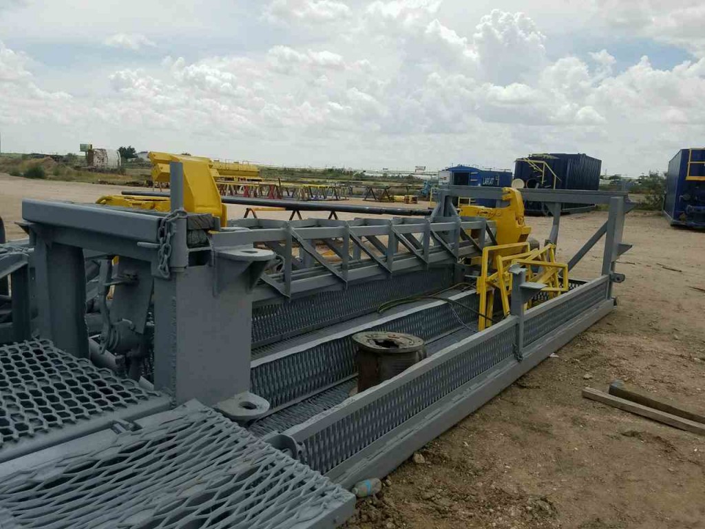 (2) Apache Walker Neer Automated Pipe Handler - Beeman Equipment Sales