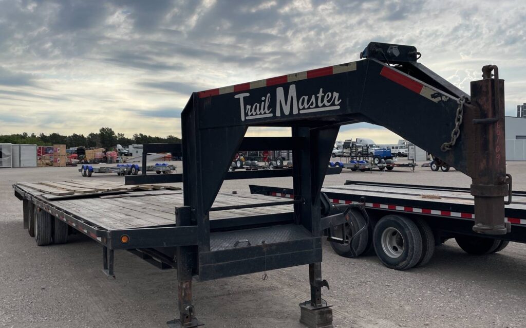 2012 Trailmaster T/A Gooseneck Flatbed Trailer - Beeman Equipment Sales